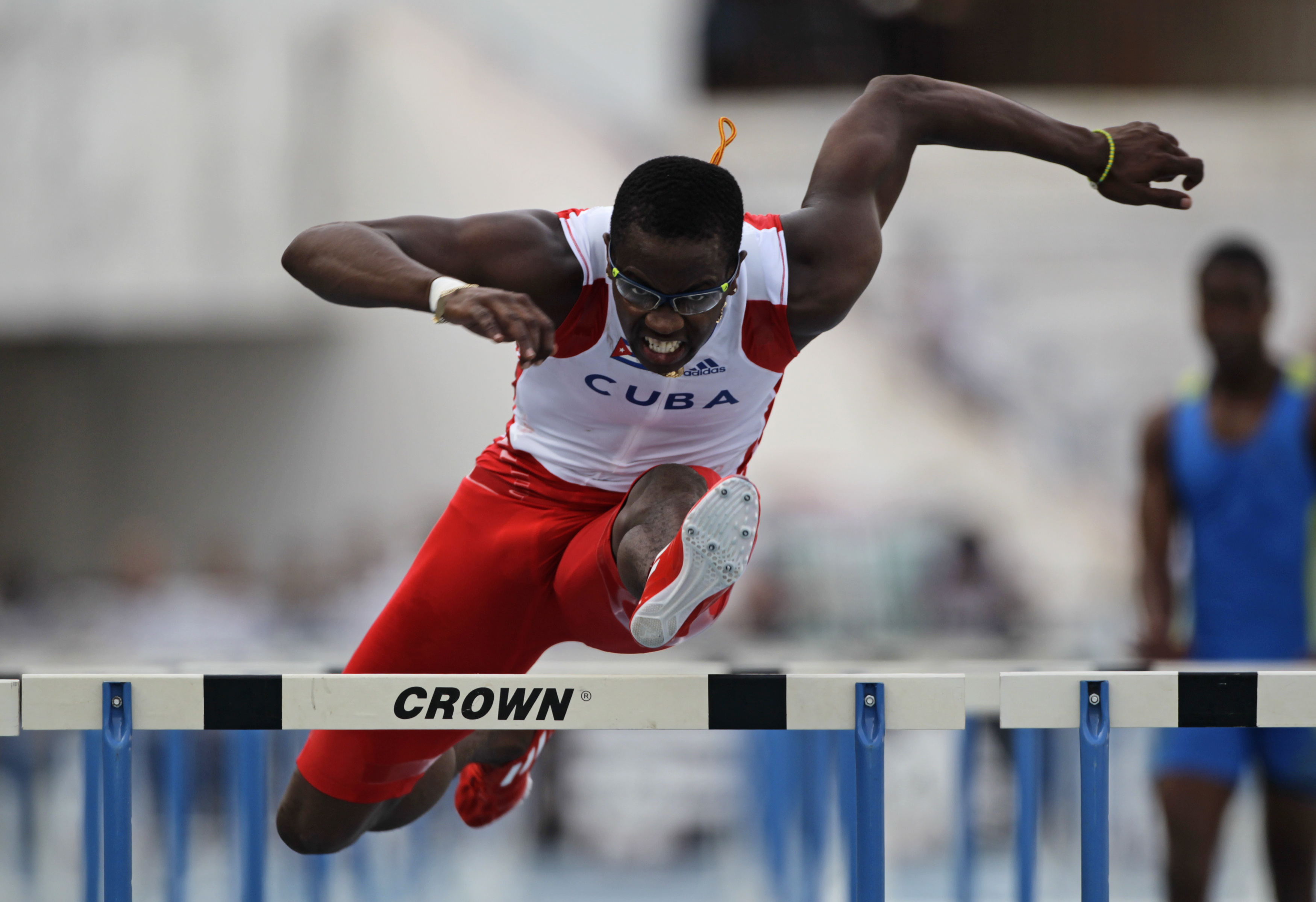 Cuba’s Dayron Robles competes in the men’s 110m hurdles final of a ...